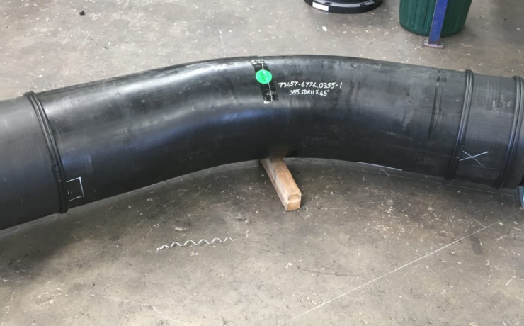 Fabricated manhole spigots